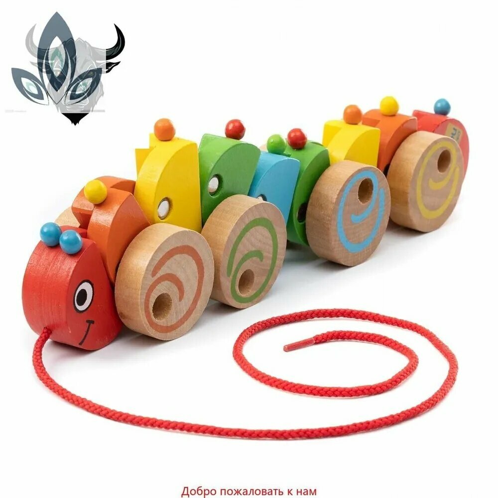 Игрушка-каталка "Гусеница" от ANDREU Toys - это забавная и увлекательная игрушка, которая станет отличным п