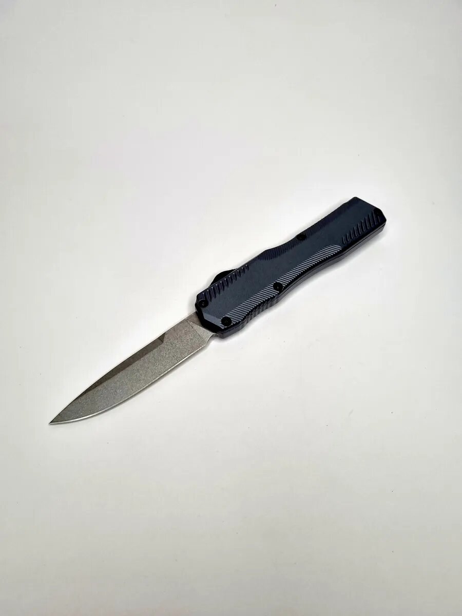 Фронтально-выкидной складной нож из стали CPM154