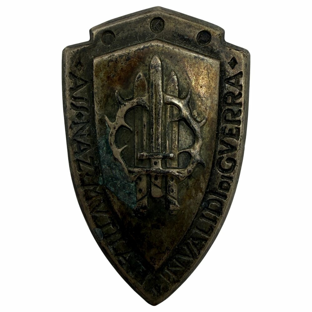 Знак "Национальная ассоциация ветеранов войны и инвалидов" Италия 1931-1940 гг.