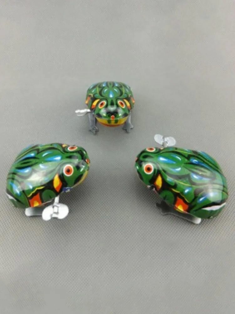 Металлическая заводная лягушка игрушка