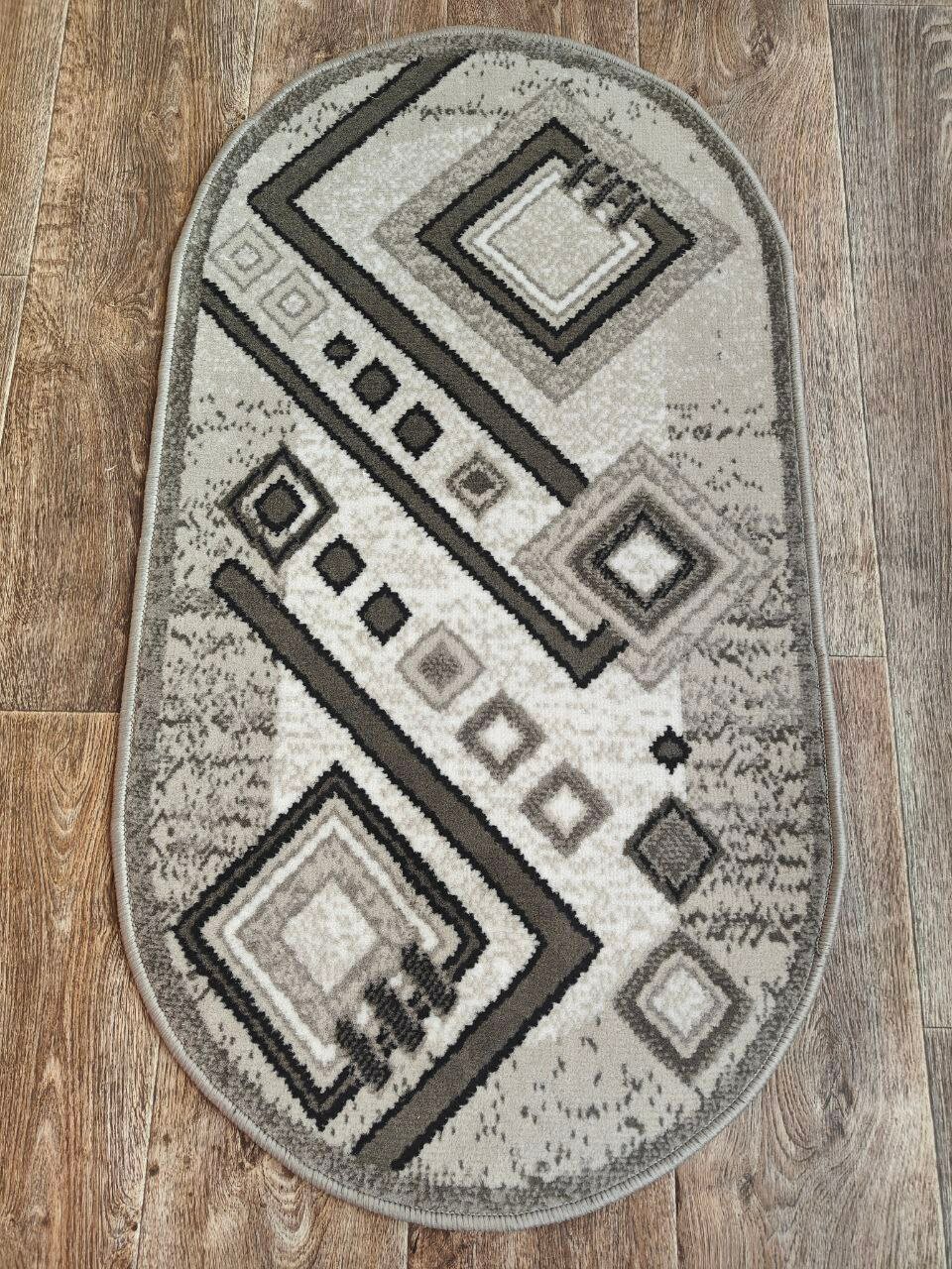 Ковер прикроватный овальный нескользящий 60 на 110 серый нанесено латексное покрытие на основу