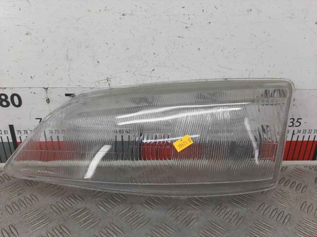 Стекло фары левой Opel Vectra B 9416L арт. 2275188