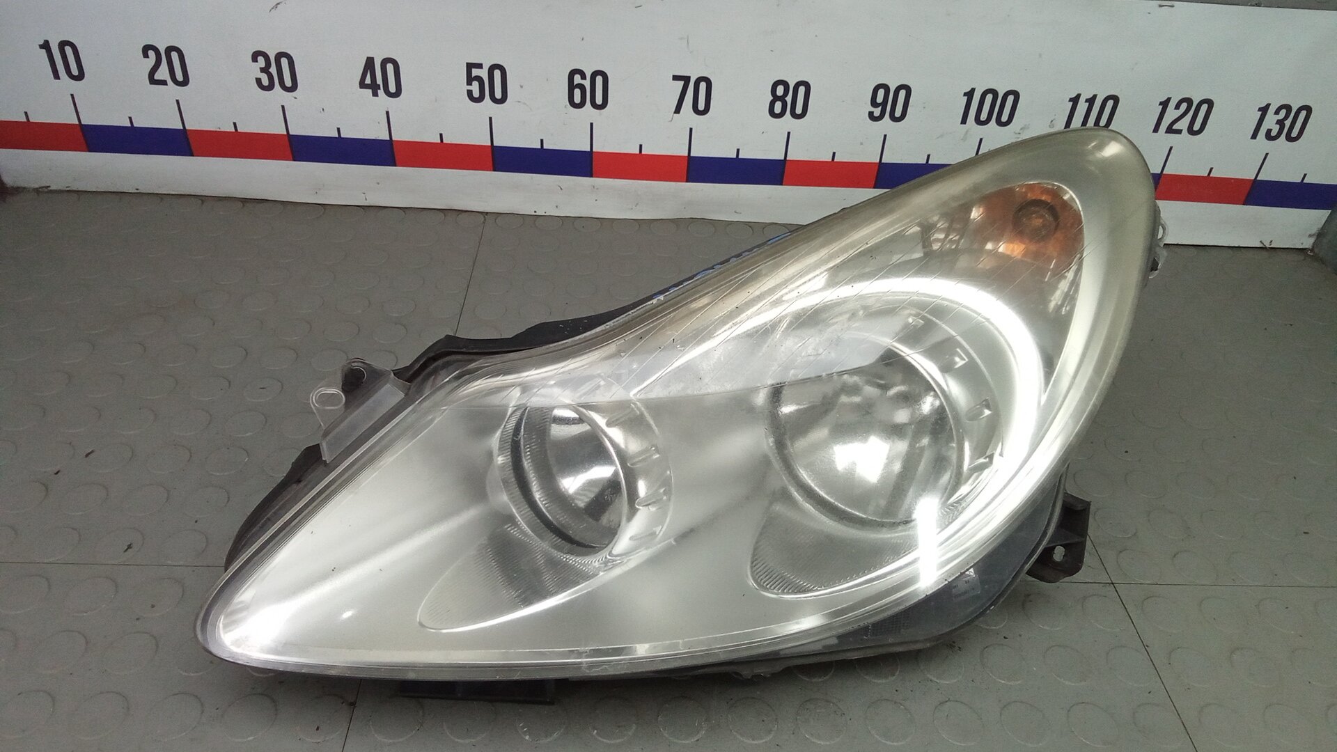 Фара левая OPEL CORSA D