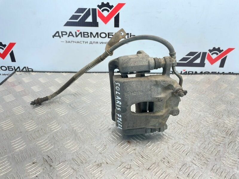 Суппорт тормозной Hyundai Solaris 2014 581304L000 RB G4FA, передний правый (с пробегом)
