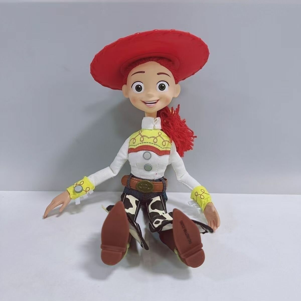 Интерактивная кукла "Джесси" История Игрушек Toy Story, пластик, текстиль, 31см, разноцветная