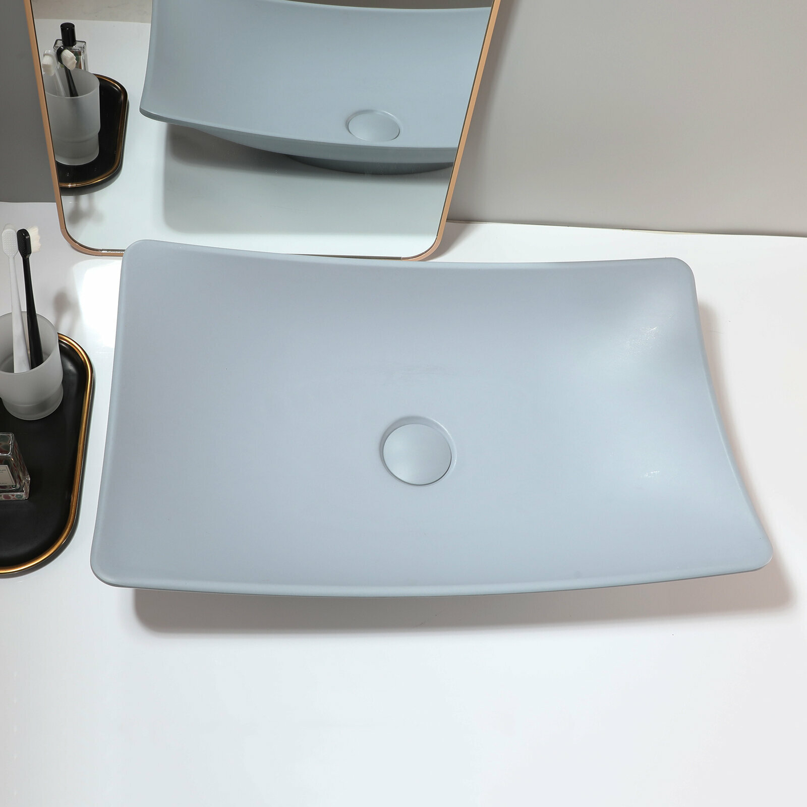 Раковина накладная со смещенным сливом, с возможностью установки на столешницу под стиральную машину， серый 56см*34см