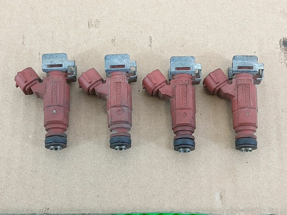 Форсунка инжекторная Nissan Almera N16 166009F600