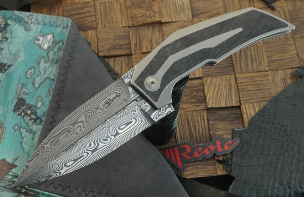 Складной нож Reate T4000, клинок Damasteel, Acid wash, рукоять титан/мраморный карбон