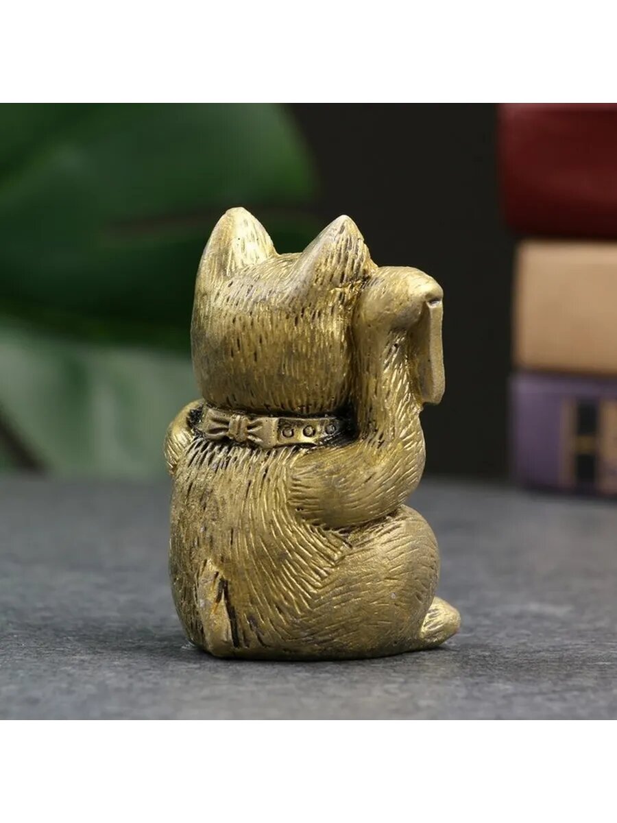Золотая фигурка для привлечения удачи