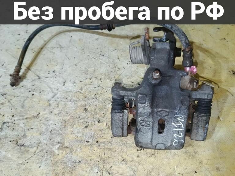 Суппорт Лево / Зад с пробегом Nissan Cefiro A33