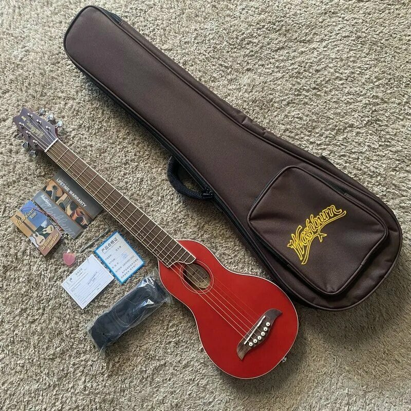34-дюймовая красная акустическая фолк-гитара с верхней декой из цельной ели от американского бренда Warrior, компактная туристическая версия в комплекте с усиленным чехлом-рюкзаком