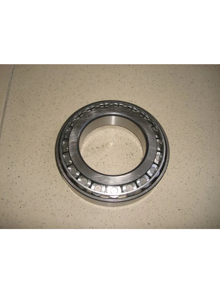 Подшипник ступицы вед. моста 140х80х26 30216/7216E TCM