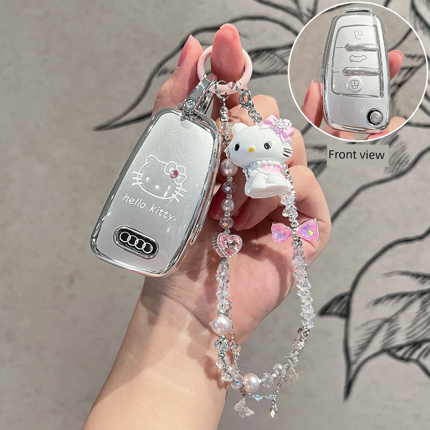 Ключевой чехол Hello Kitty в песочном серебре с комплектом браслета