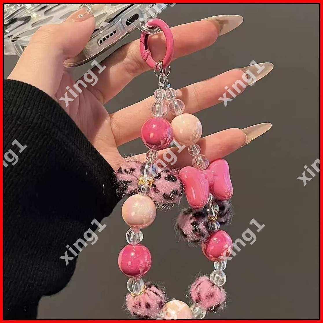 Эксклюзивный брелок с ремешком для смартфона в розовом стиле