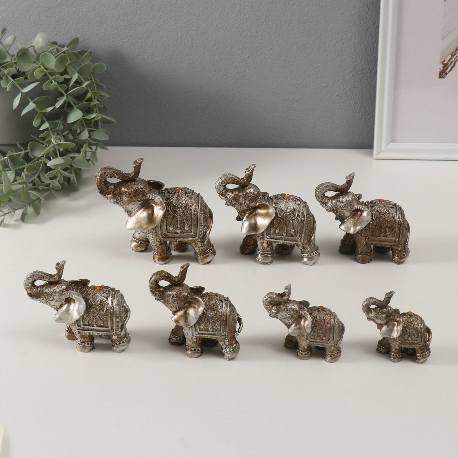 Набор фигурок "Семь слонов в попонах с пышным цветком", 7 шт, полистоун