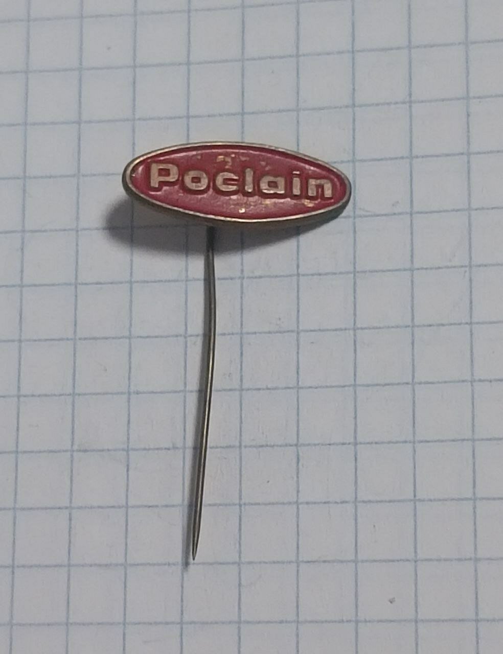 Значок "Poclain"