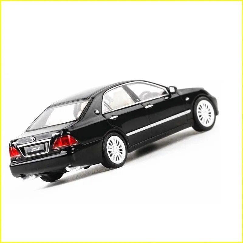 Масштабная модель автомобиля Toyota Crown JKM, черный цвет, масштаб 1:64, инерционный механизм — фото 1