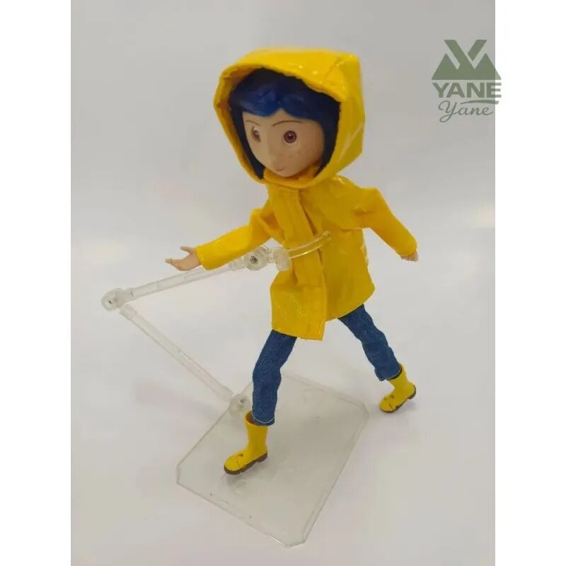 Фигурка Коралины (Coraline) в желтом дождевике из фильма "Коралина в Стране Кошмаров" - ПВХ — фото 1