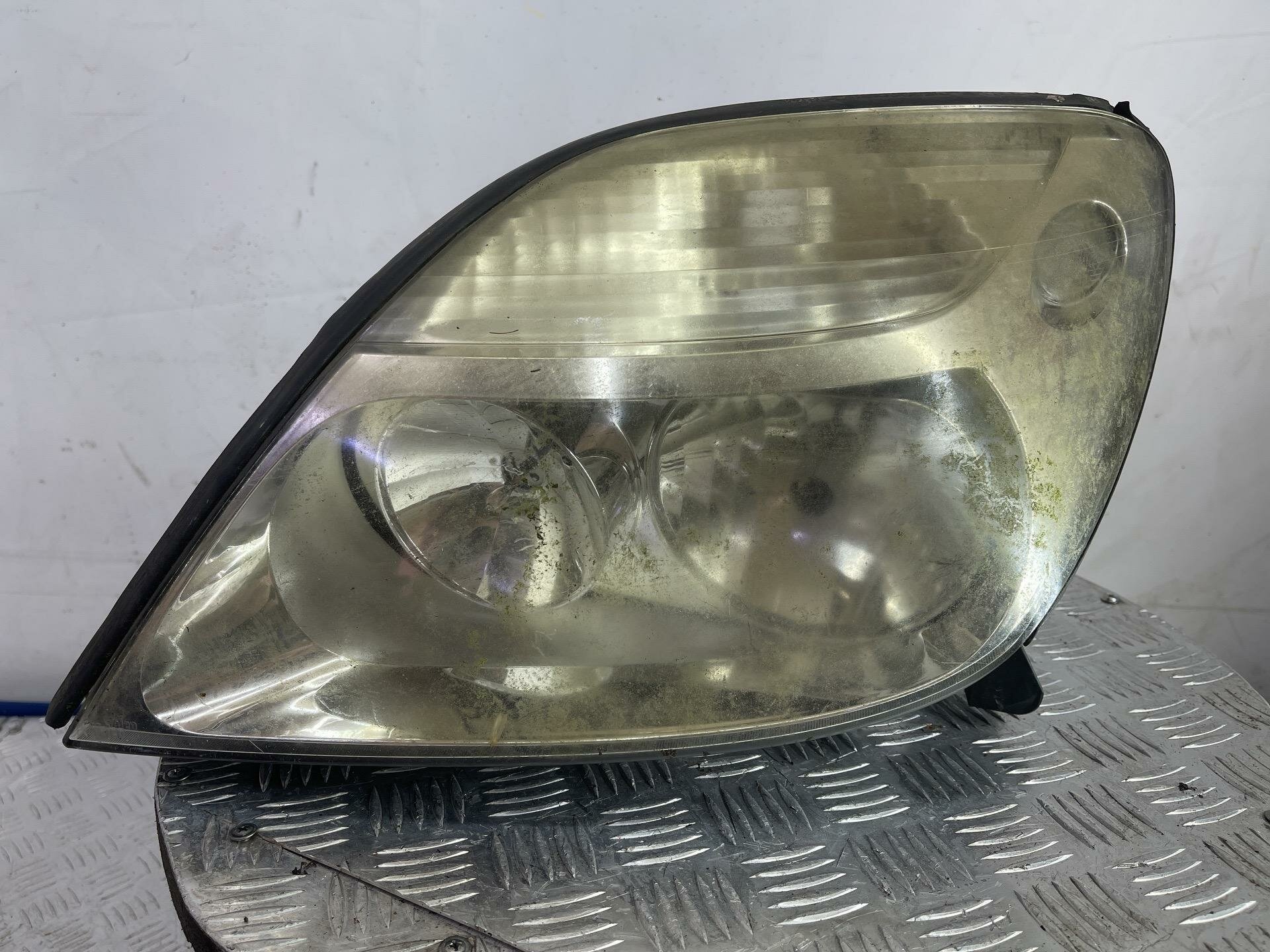 Фара левая Renault Scenic рест. 2001 7700432098