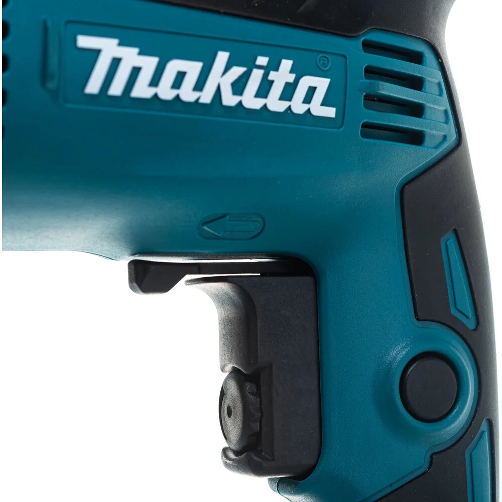 Дрель Makita DP2010 с реверсивным режимом, щеточным двигателем и ключевым патроном, профессиональный для мягких — фото 1
