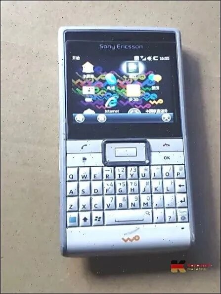 Белый мобильный телефон Sony Ericsson m1i - надежная звонилка с функцией интернета для работы, сенсорная клавиатура