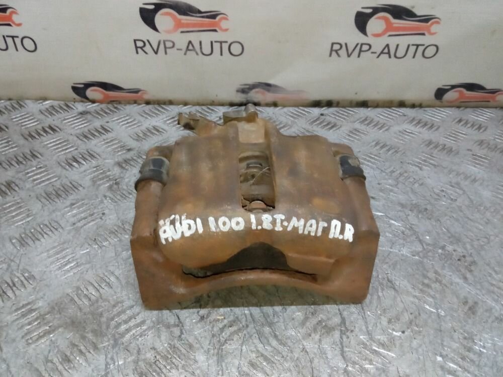 Суппорт передний левый Audi 100 C3 1982-1991 Audi