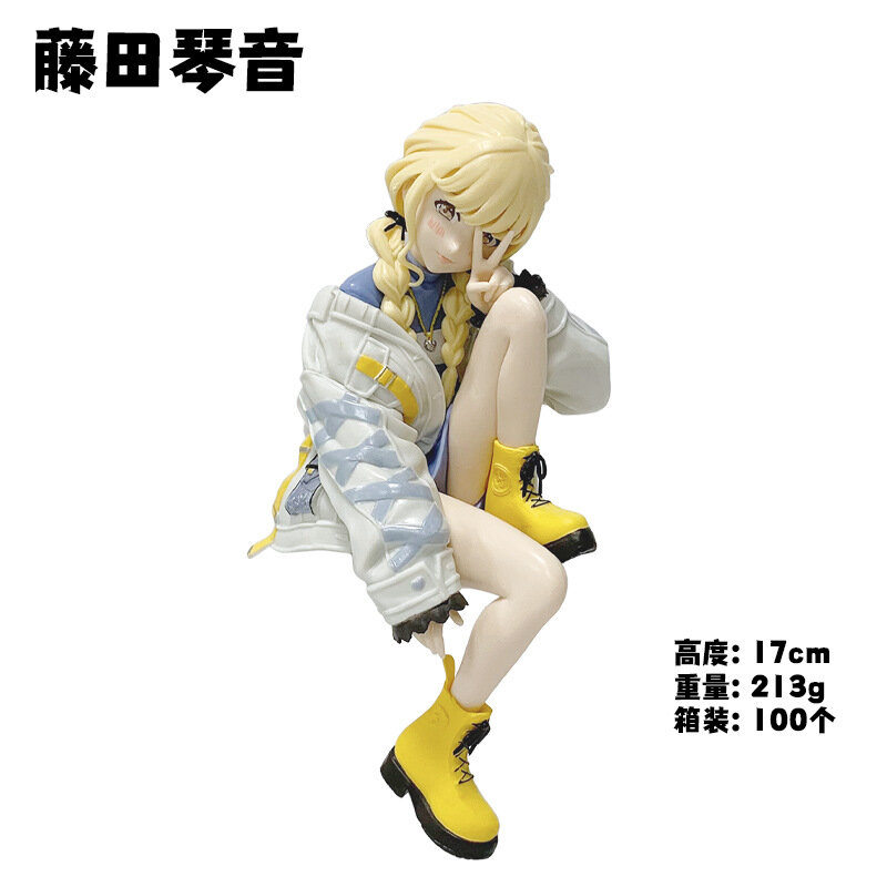 Фигурка Фудзиты Котоне в очаровательной позе из игры Idolmaster, изображающая милую девушку, сидящую за прессом для лапши быстрого приготовления.