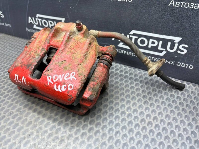 Суппорт тормозной Левый Передний Rover 400 1996 (1.6 16K4F) Б/У с пробегом Арт. 21545 — фото 1