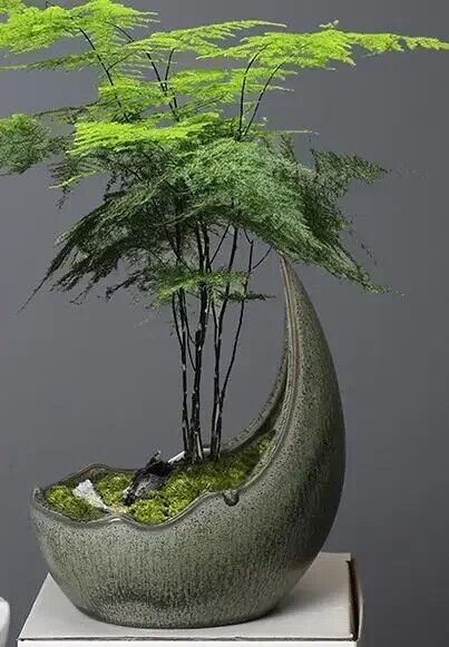 Керамический горшок для цветов в форме рога носорога зеленый