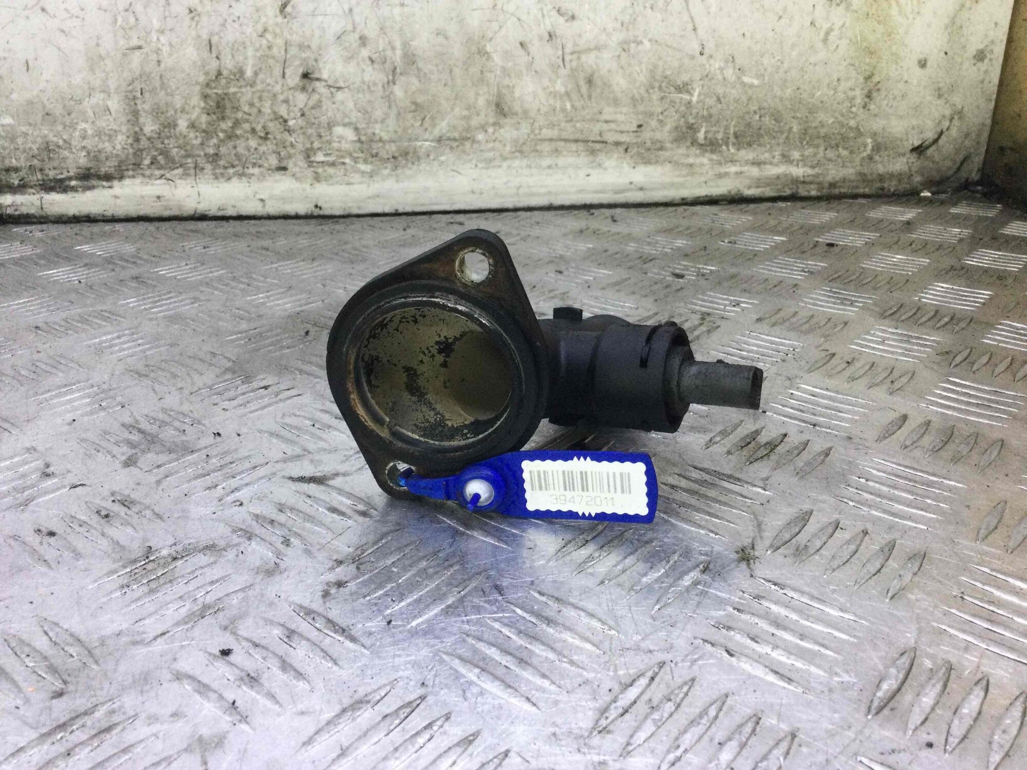 Б/У Фланец (тройник) системы охлаждения Volkswagen Passat B6 (2005-2010) 2010 г.