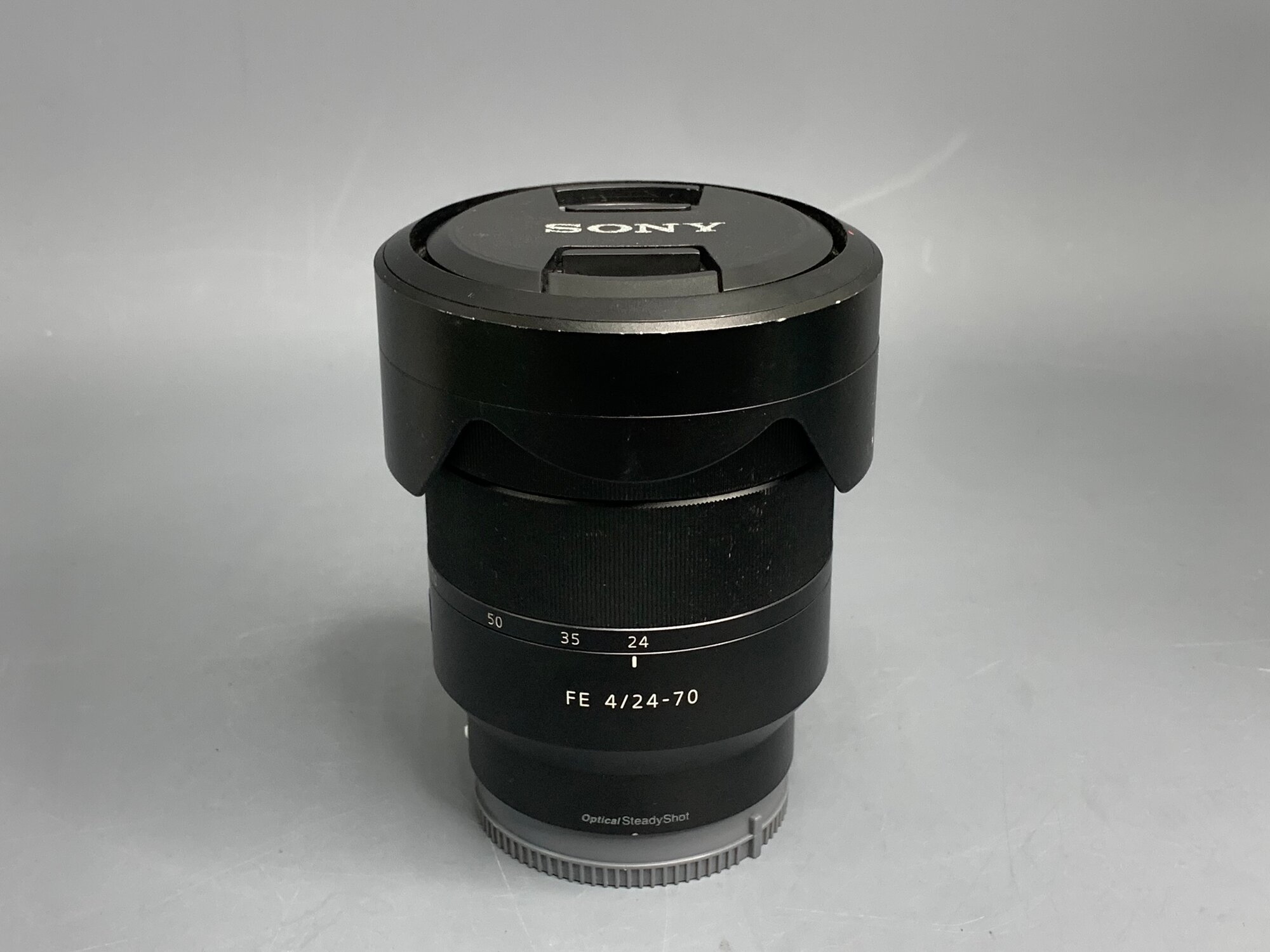 Sony 24-70mm SEL-2470Z Царапины на линзе