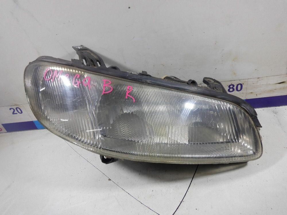 Фара правая Opel Omega B 90566796