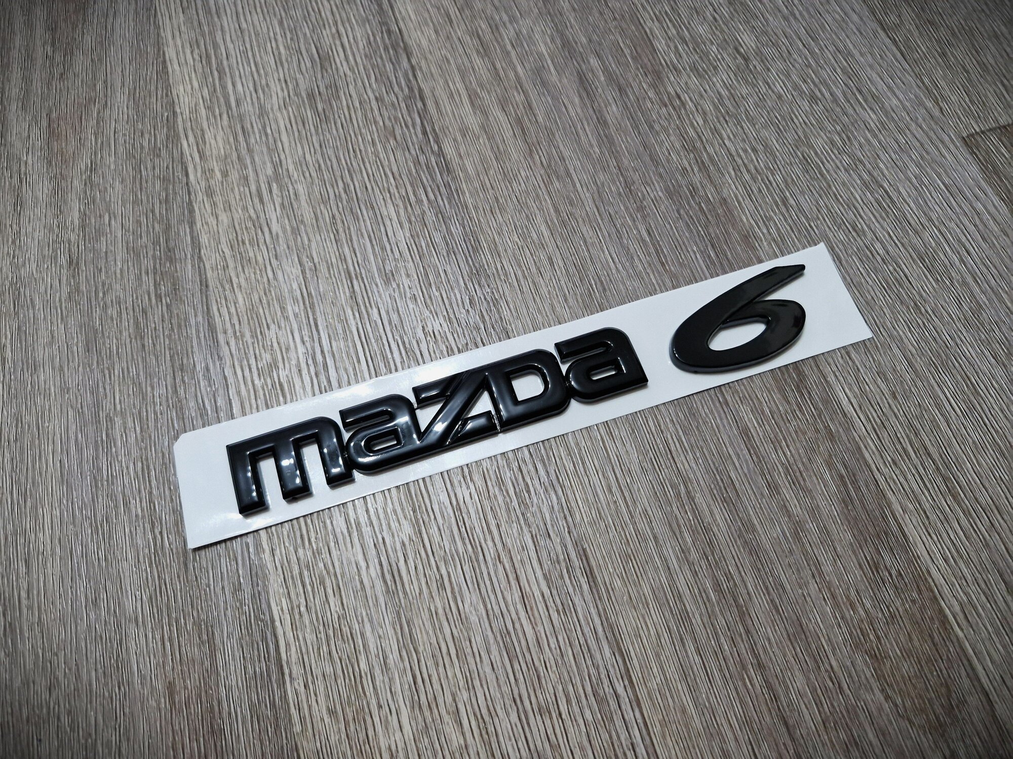 Эмблема шильдик надпись Mazda 6 черная на крышку багажника на Mazda Мазда 6 (2002-2012 г. в.)