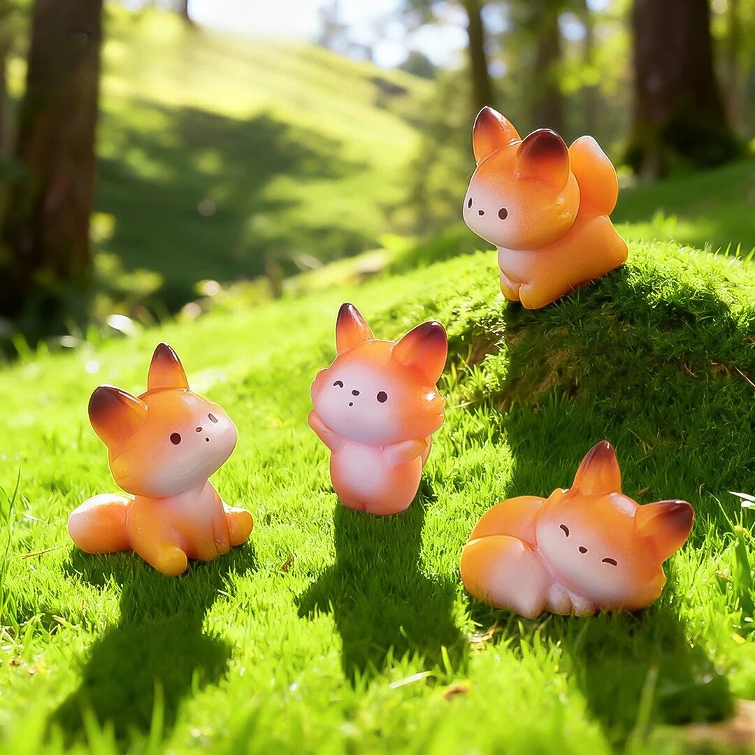 Миниатюрные фигурки лис из резины 4pcs