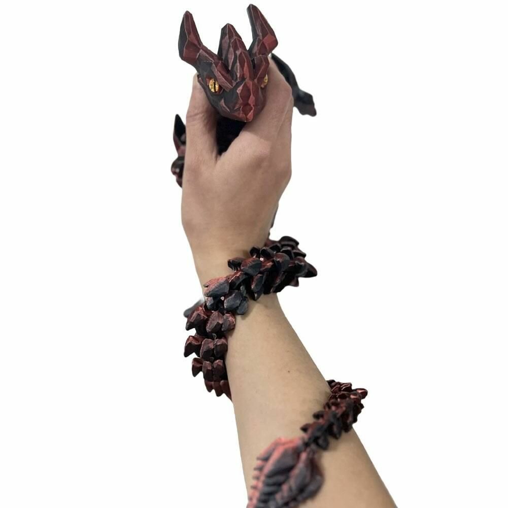 Игрушка-дракон и динозавр, напечатанные на 3D-принтере.