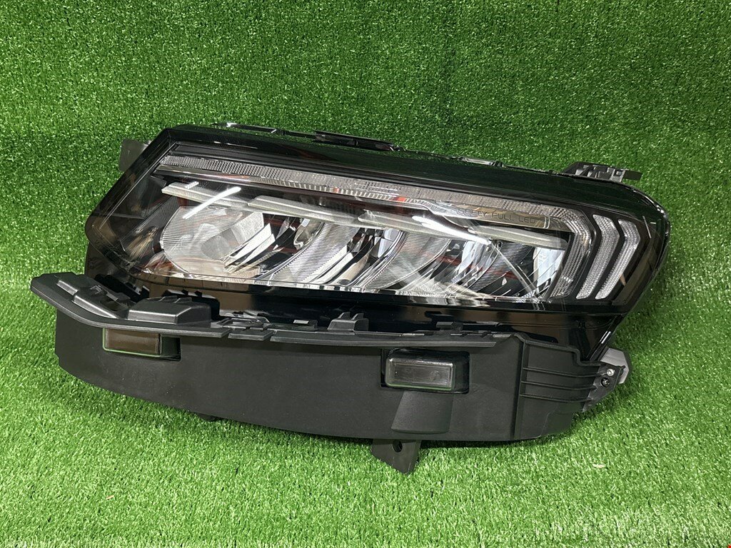 Фара левая Geely Tugella 7051040900 арт. 2264635