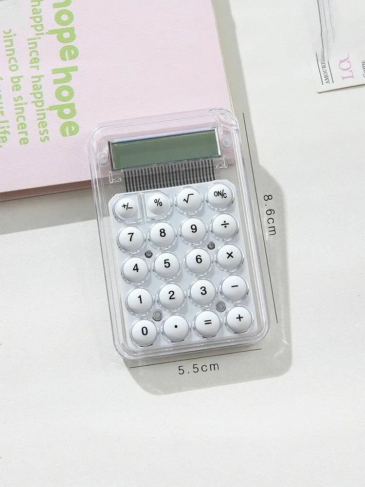 Милый и компактный мини-калькулятор ярких цветов, подходящий учащимся для решения задач или повседневных математических вычислений.
