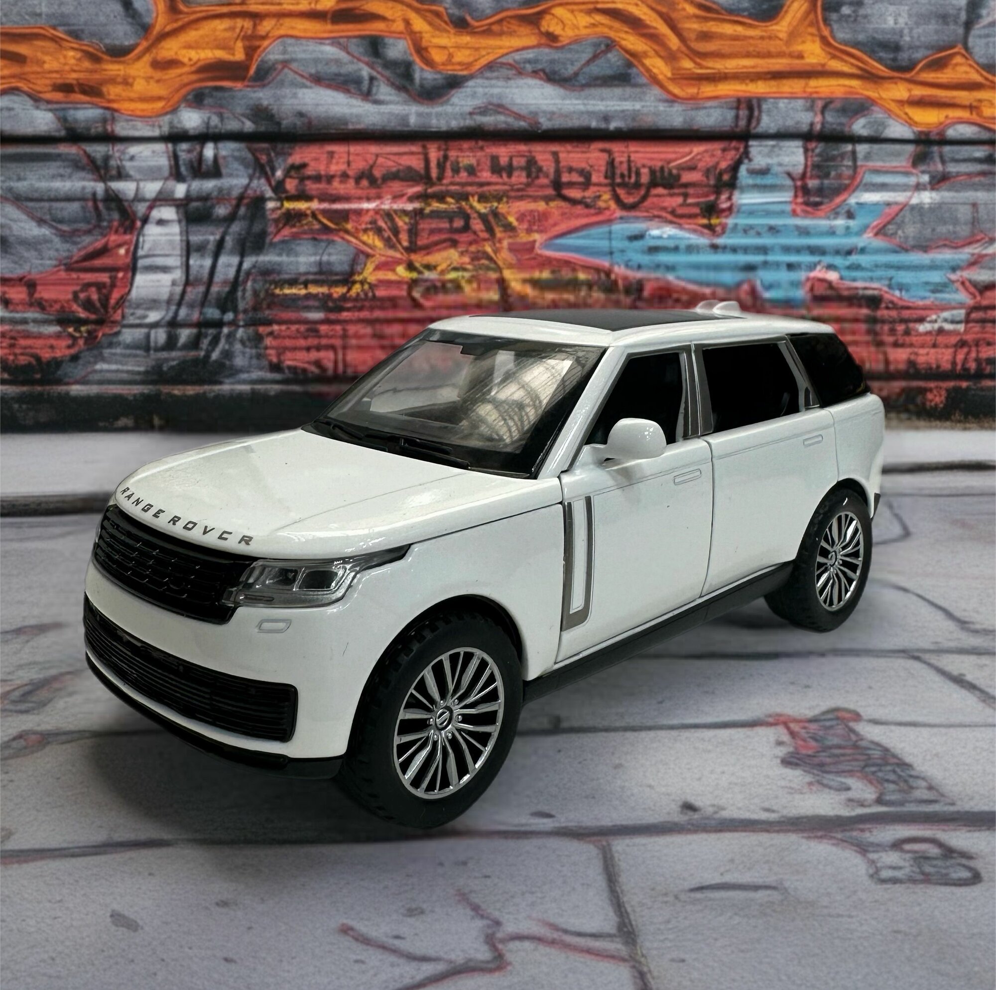 Машинка металлическая музыкальная Range Rover 1:32 Ренж Ровер
