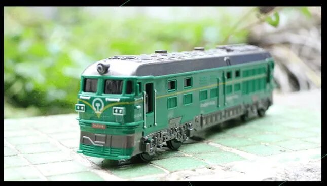 Игрушка модель тепловоза поезда ТЭП60 с подсветкой зеленый