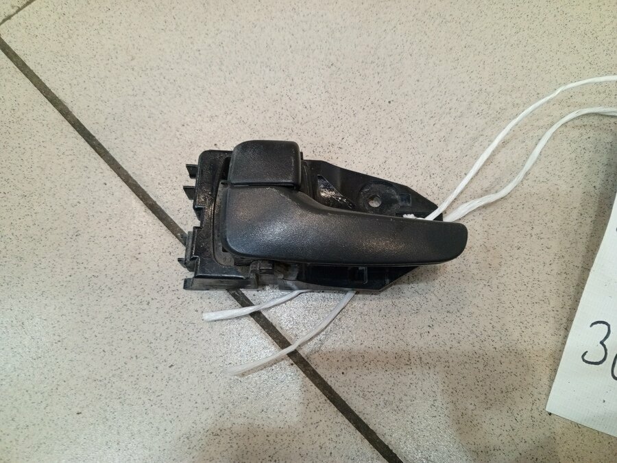 Ручка двери внутренняя левая от Mitsubishi Lancer 9 CS 2000-2008