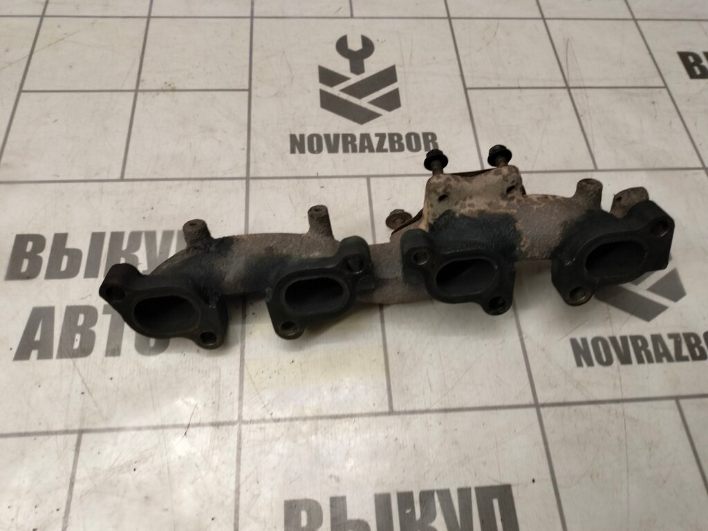 Коллектор выпускной Mazda 323 BJ Protege Familia 1998-2002