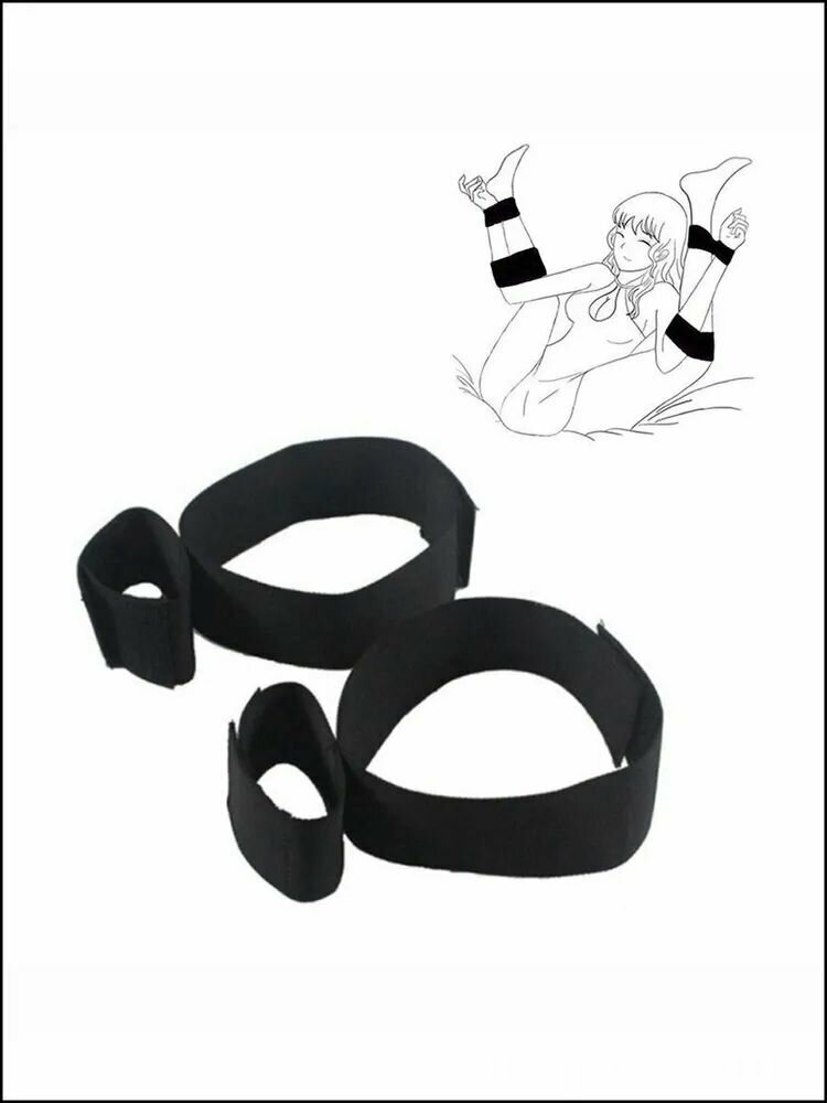 Женские руки и ноги, связанные и закованные в черные наручники