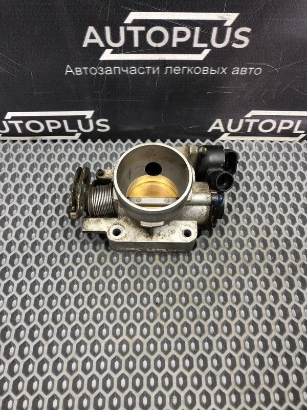 Дроссельная заслонка