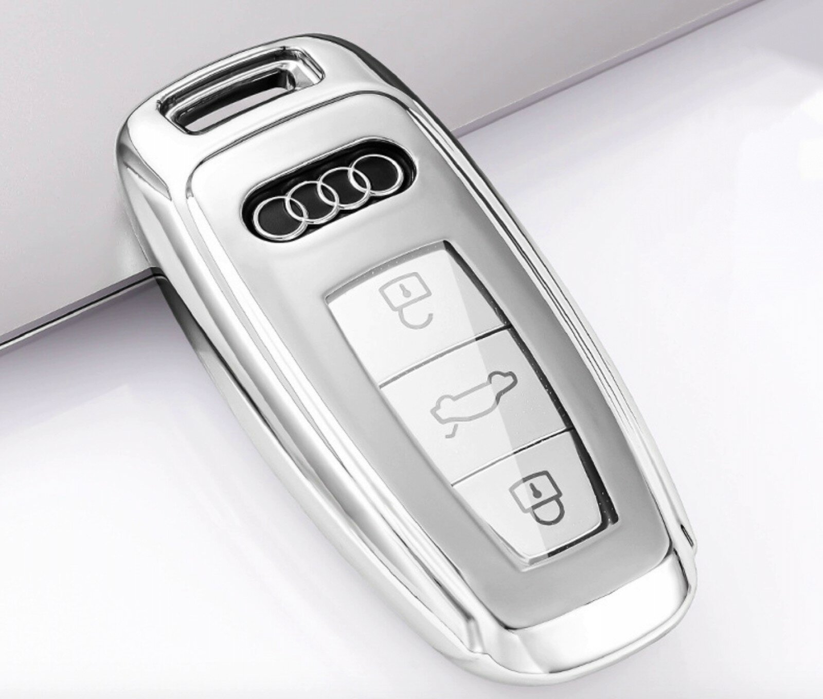 Защитный чехол MyPads M-237434 для смарт ключей Audi с вырезом под логотип серебро белый