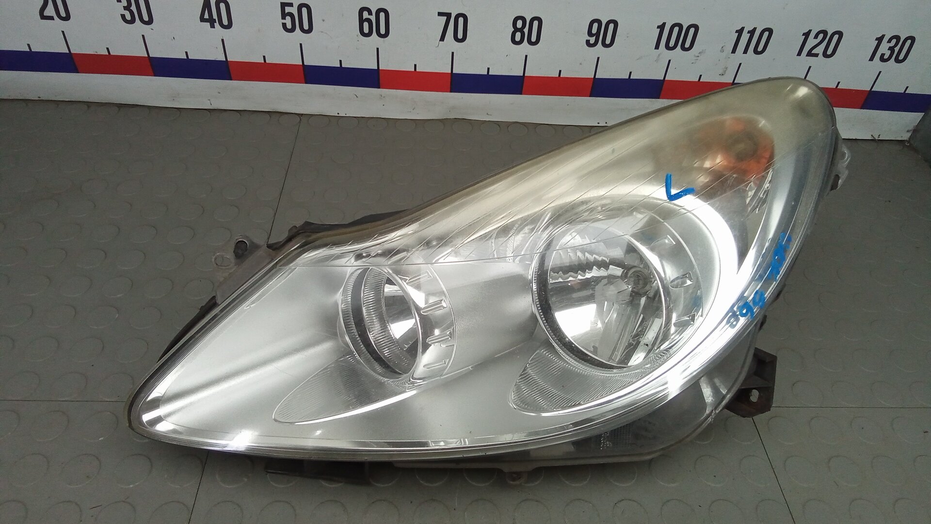 Фара левая OPEL CORSA D