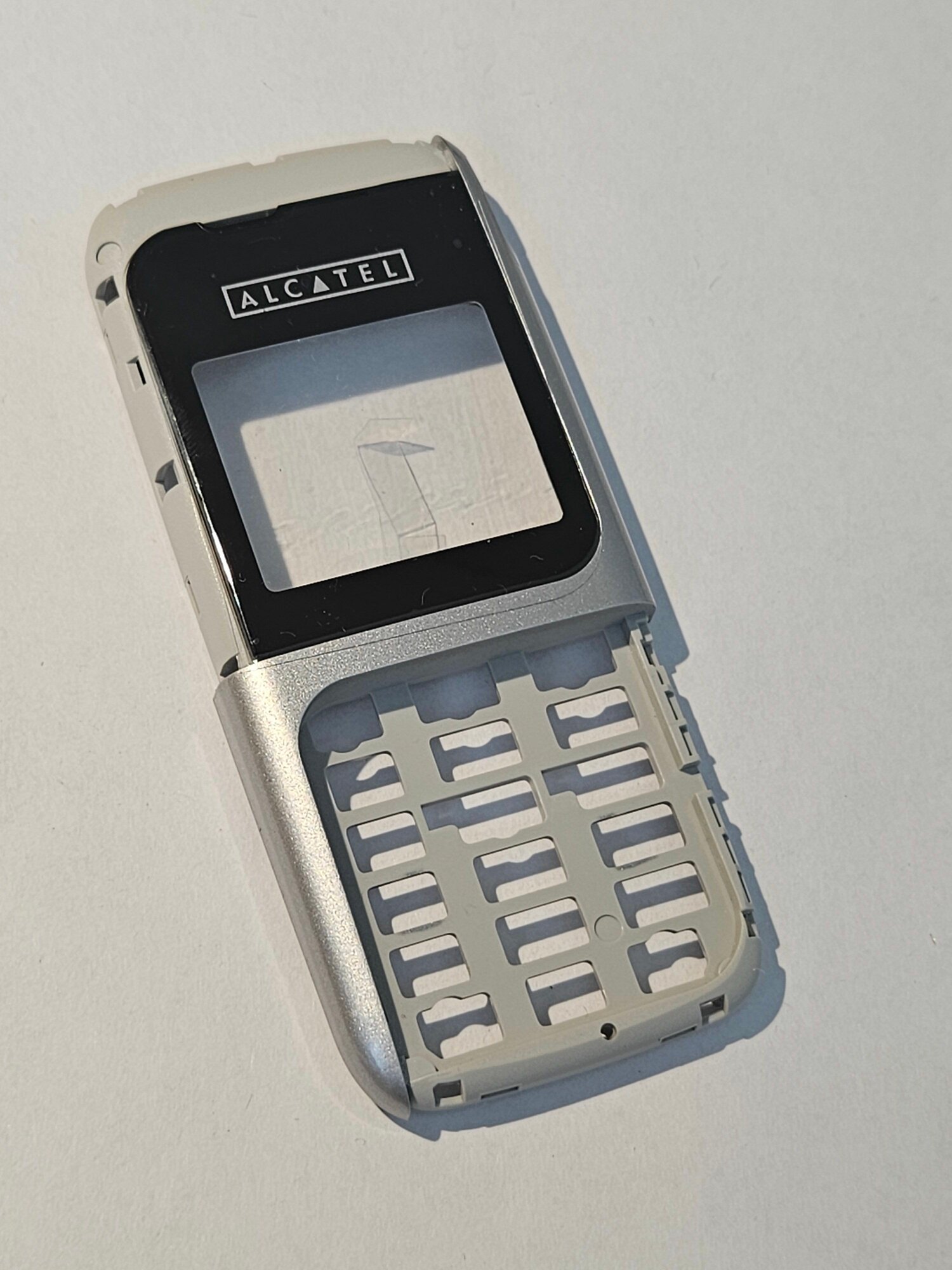 Передняя панель для Alcatel OT E105 (цвет - silver) со стеклом, оригинал