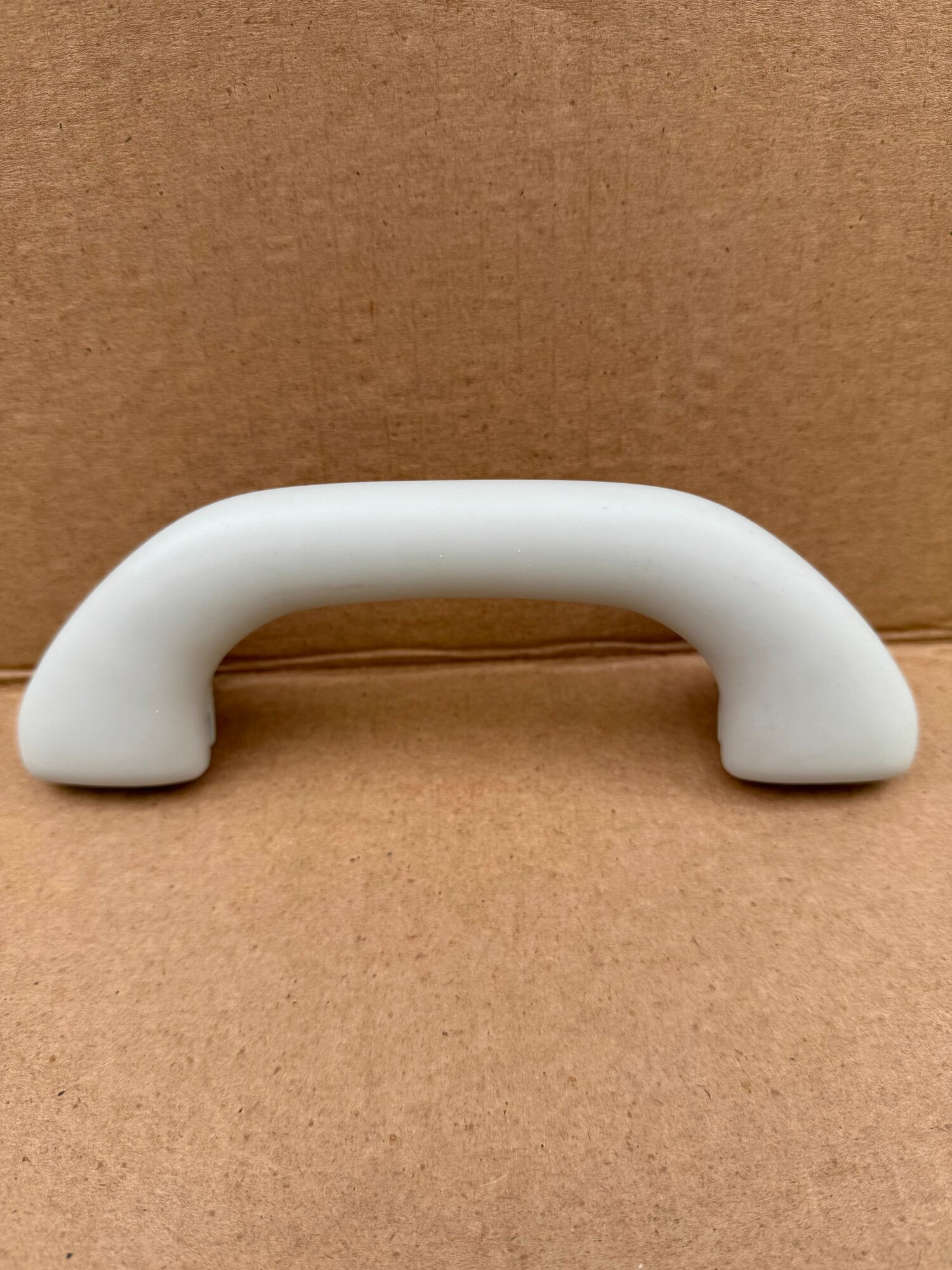 Ручка потолка для Polo, Rapid, Fabia, Toledo (VAG) передняя откидная VAG оригинал новая серая 5L6857607MY20