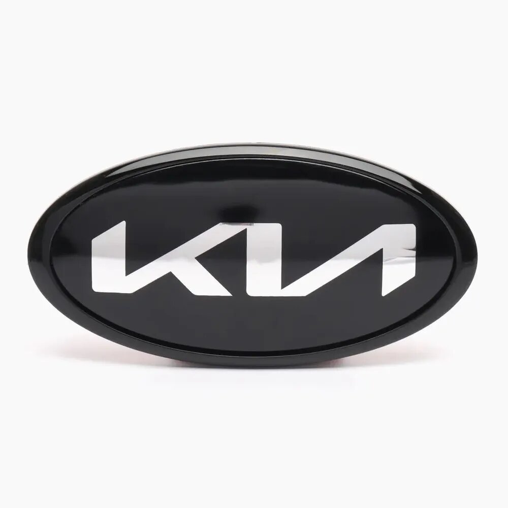Логотип, эмблема автомобиля KIA нового образца 13 х 6,5 см, серебристые буквы, черный обод