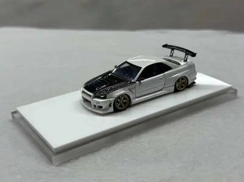 Модель автомобиля Nissan Skyline GT-R34, 1/64, White carbon cover