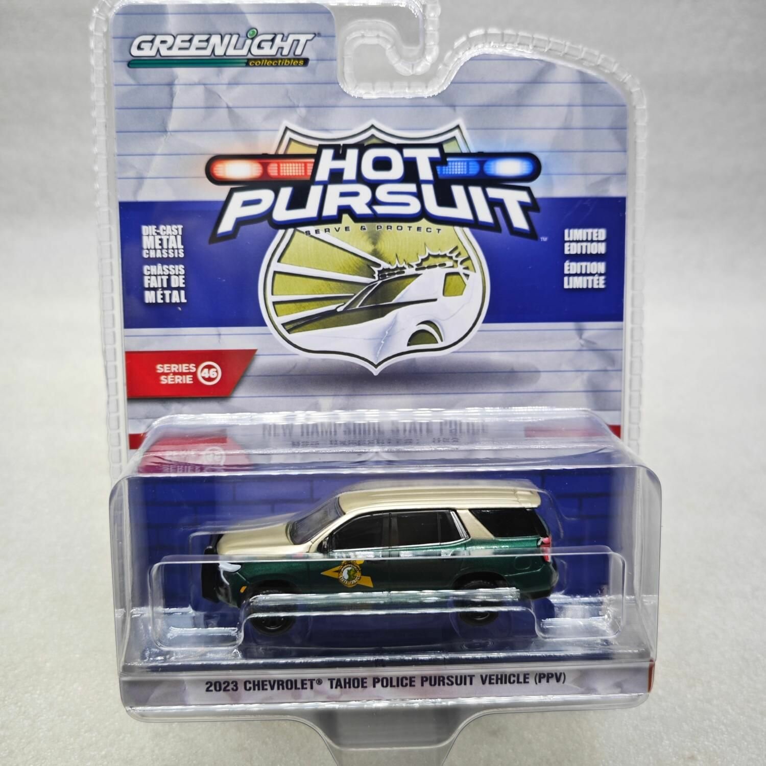 Green Light 1:64 Серия Hot Pursuit 46 - 2023 Chevrolet Tahoe Патрульный автомобиль полиции штата Нью-Гэмпшир PPV